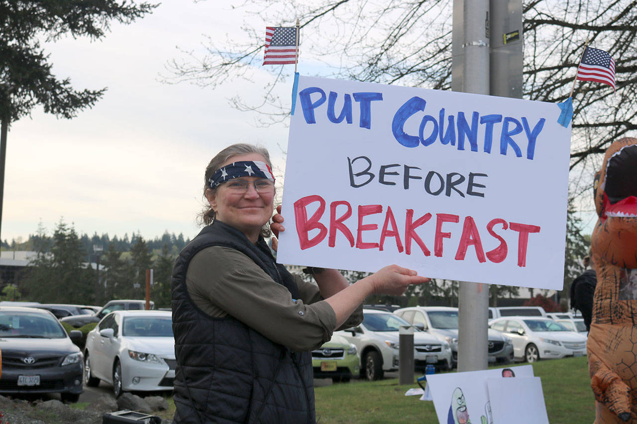 Local activist groups hold rally outside Dino Rossi fundraiser ...